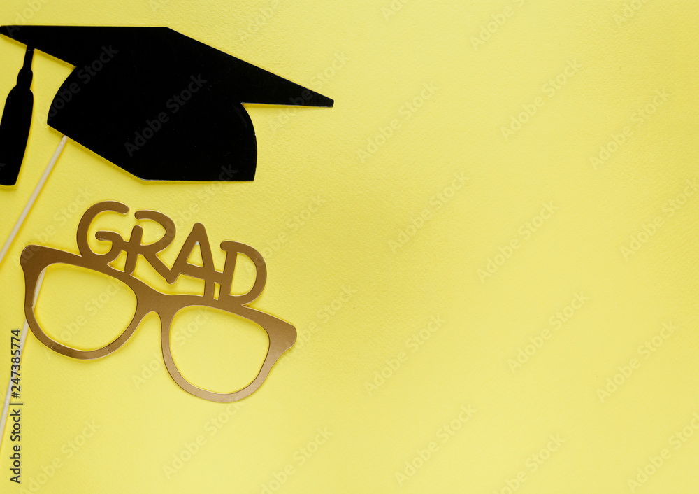 Creative background with photobooth props for graduation: hats, diploma ...