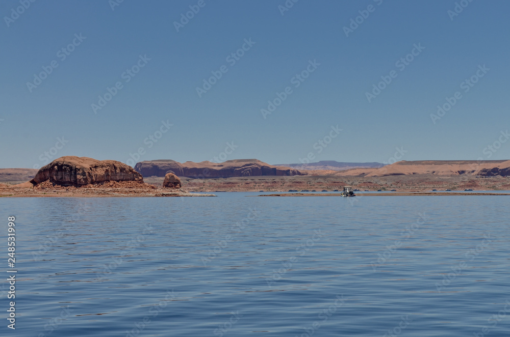 sandstone buttes on the shores of Lake Powell in Glen Canyon National ...