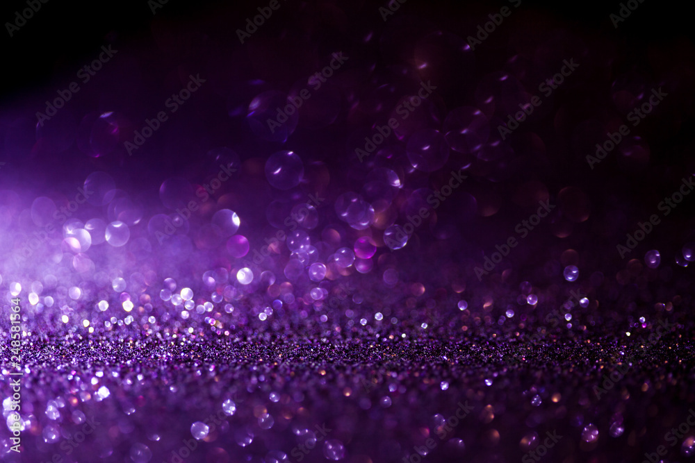 Purple glitter magic background. Defocused light and free focused place ...
