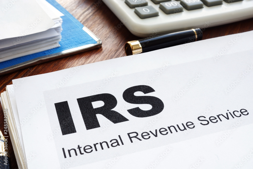 IRS Internal Revenue Service documents and folder. Stock Photo | Adobe ...