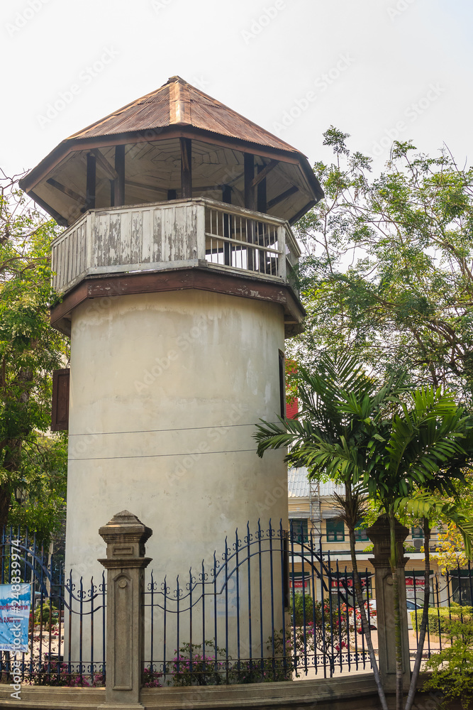 Old prison guard tower that constructed with brick, wood and red roof ...