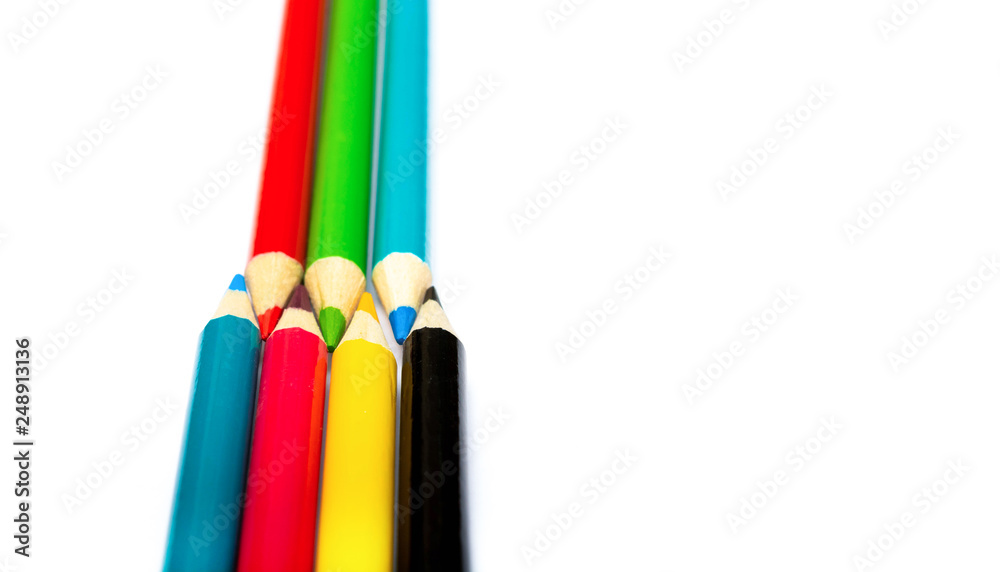 Seven colored pencils. The colors red, green, blue, cyan, magenta ...