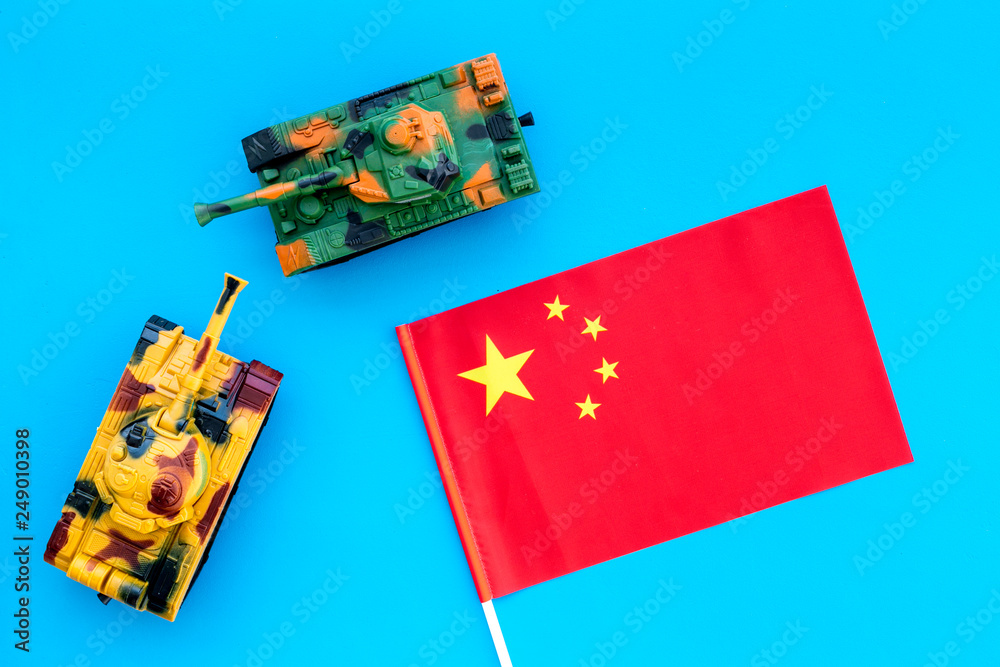 War, military threat, military power concept. China. Tanks toy near ...