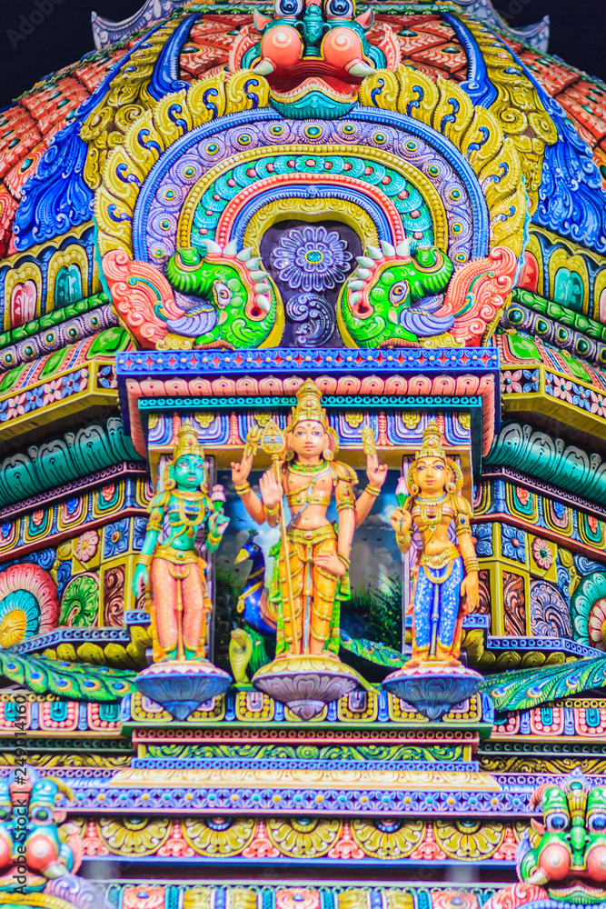 Colorful night view of indian gods sculpture at Sri Maha Mariamman ...