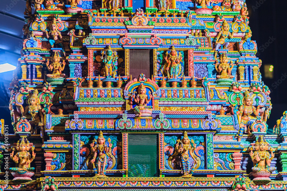 Colorful night view of indian gods sculpture at Sri Maha Mariamman ...