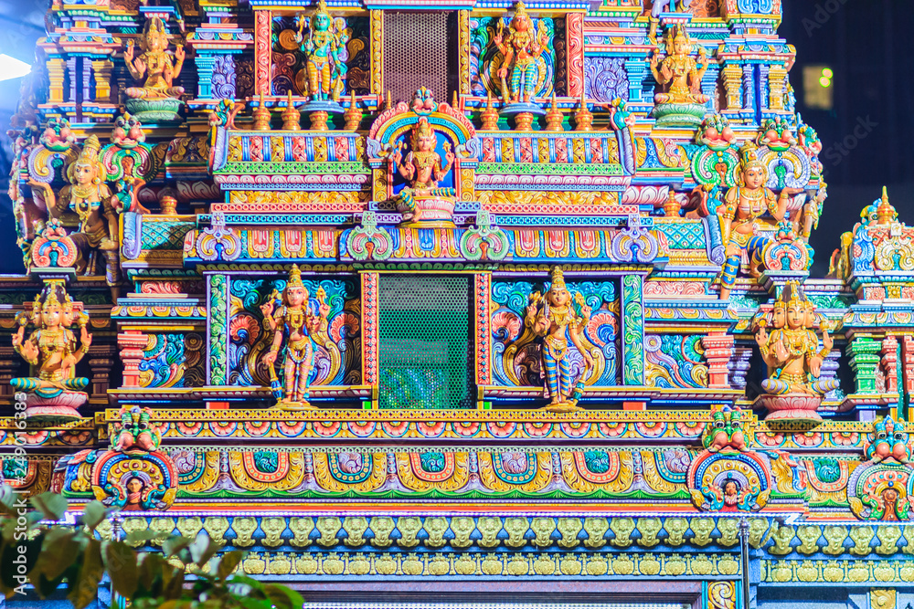 Colorful night view of indian gods sculpture at Sri Maha Mariamman ...