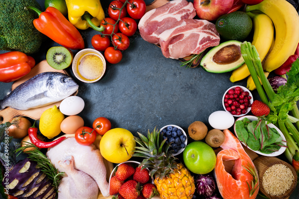 Healthy food background. Fresh fruits, vegetables, meat and fish on ...