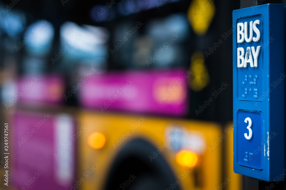 City bus at bus station bay Stock Photo | Adobe Stock