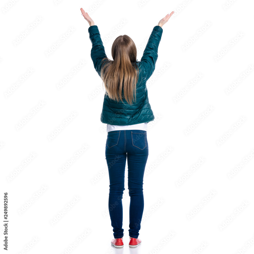 Woman in jeans and jacket hands up on white background. Isolation, back ...