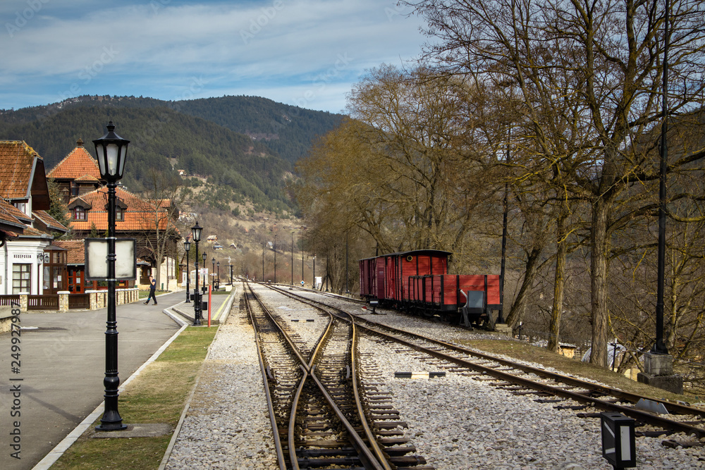 Old railroad station with narrow gauge railway track, popular tourist ...