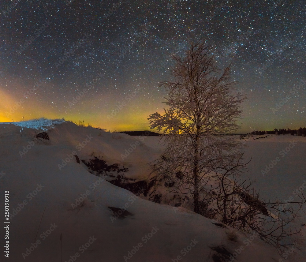 Northern lights on Lake Ladoga in the Republic of Karelia. Full moon ...