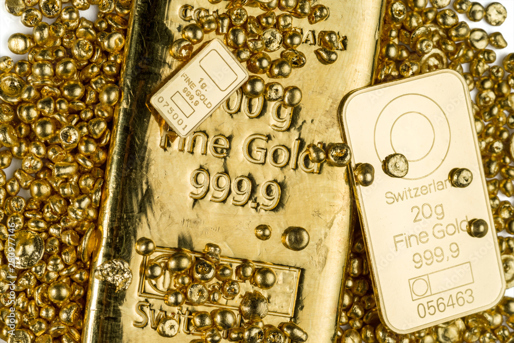 Three gold bars of different weights lie in a pile of gold granules. On ...