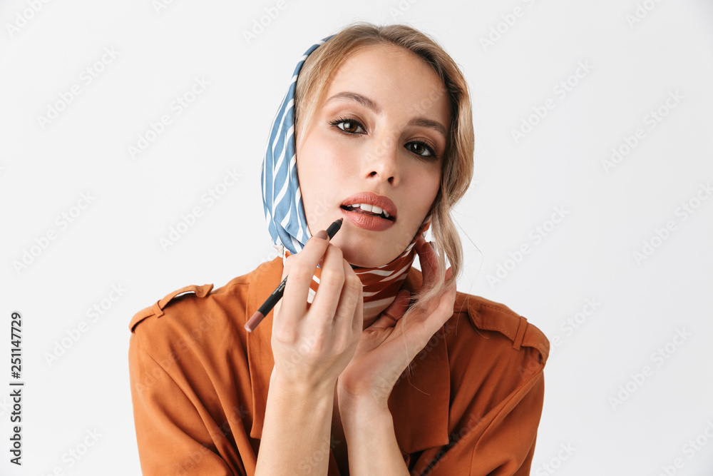 Beautiful young woman wearing silk stylish scarf posing isolated over ...