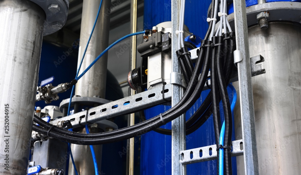 Large industrial water treatment and boiler room. Cable glands ...