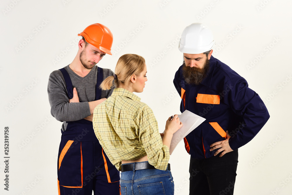 We build certainty. Construction workers team. Group of constructing ...