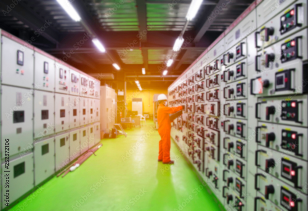 Engineer checking and monitoring the electrical system in Electrical ...
