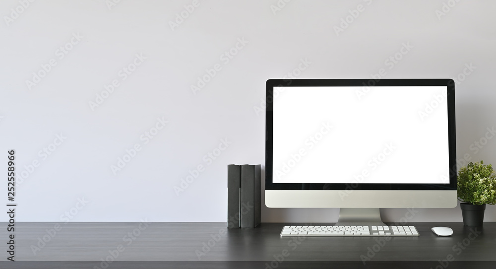 Workspace pc computer and books on black office desk and copy space ...