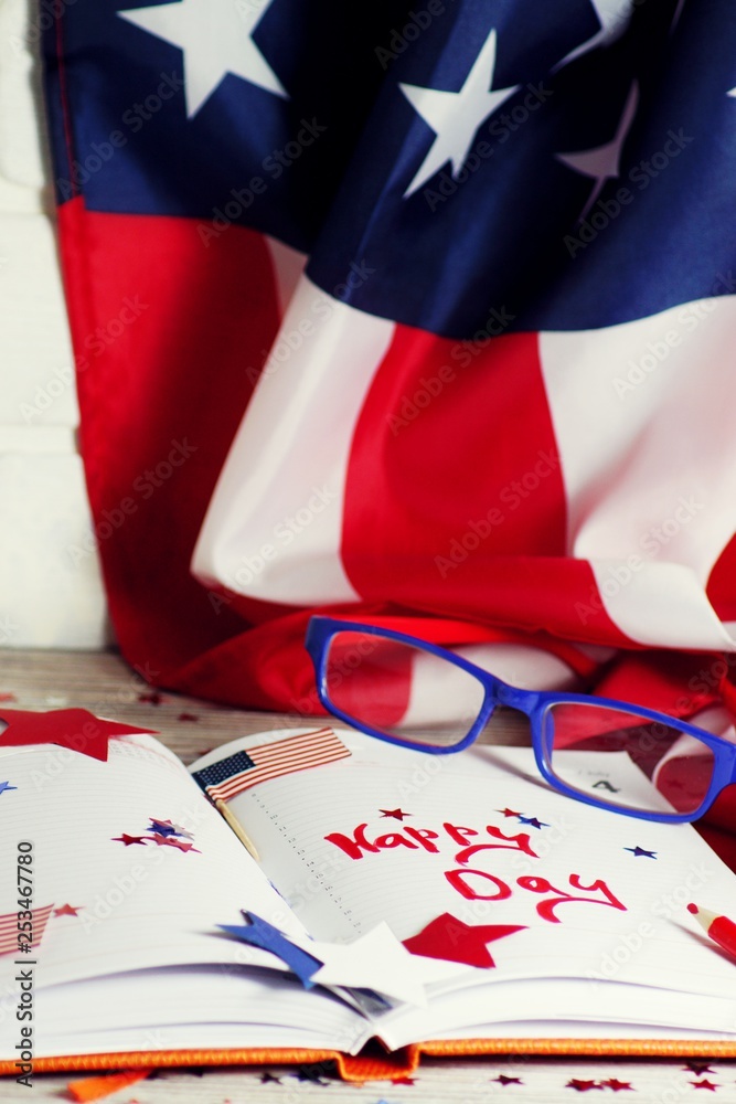 Diary with glasses open on the date of July 4, happy independence day ...