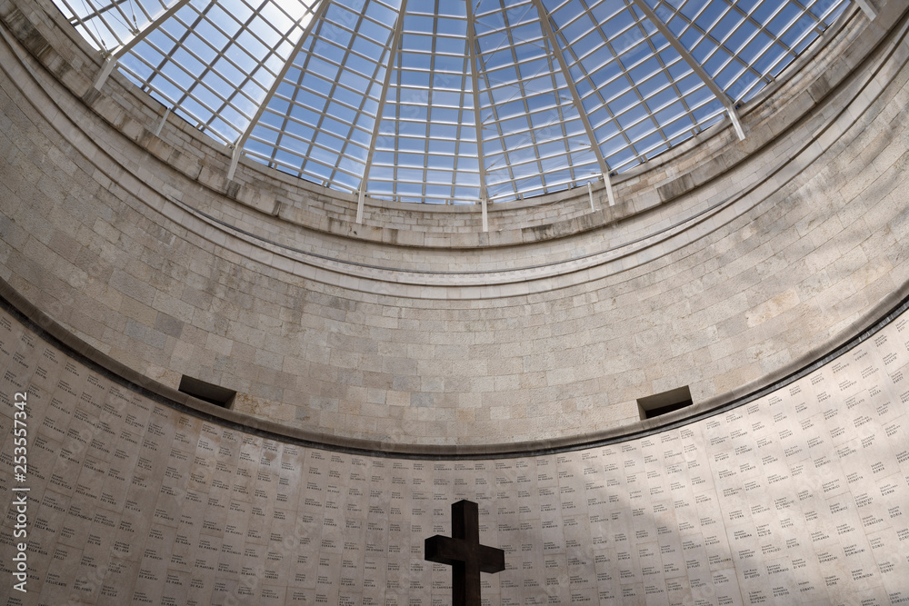 Cross under skylight in central tower with names of the interred at the ...