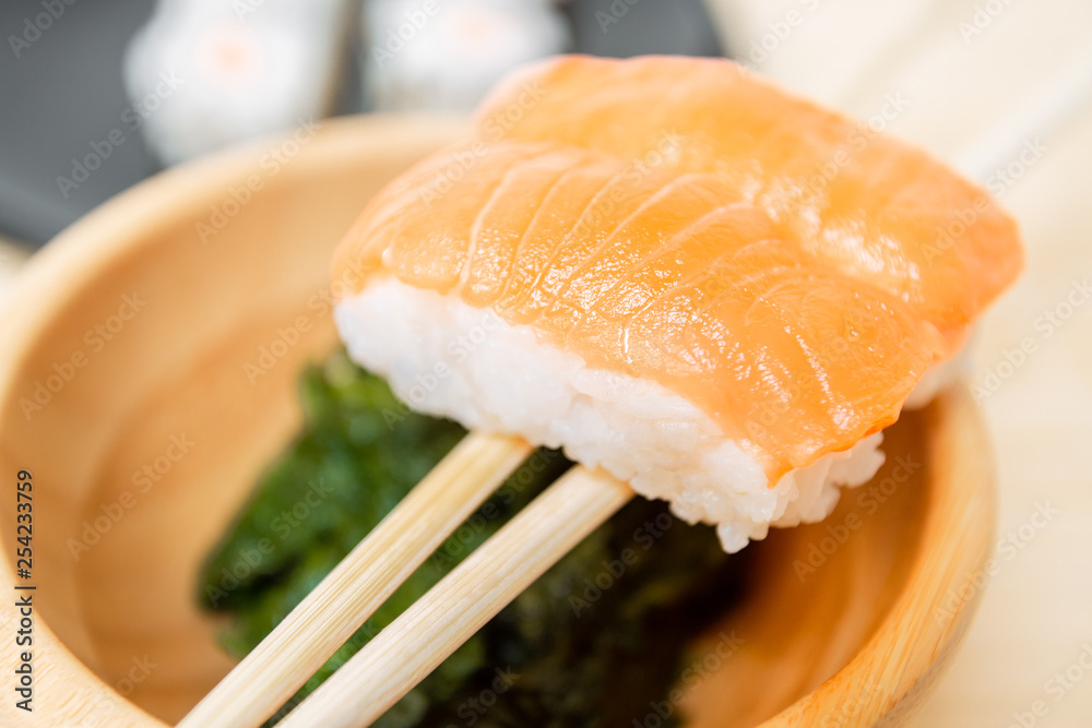 Sushi, a typical Japanese food prepared with a base of rice and various ...