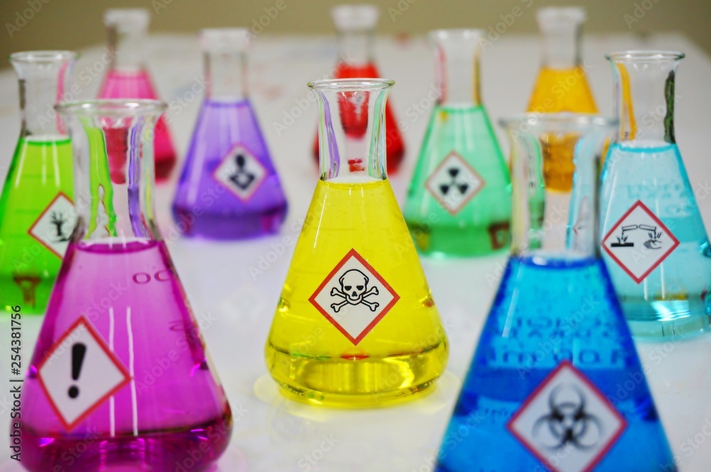 Many of Erlenmeyer flask with colorful solution and Variety type of ...