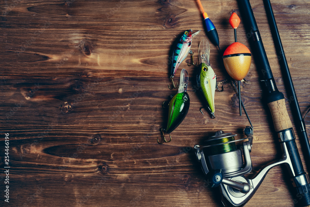 Art sports fishing rod and tackle background Stock Photo | Adobe Stock