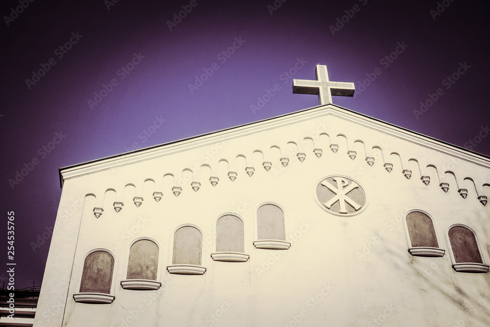 Standing out in purple color style of a single Christianity cross of ...