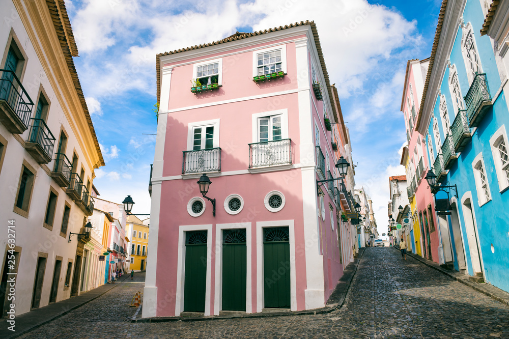 Scenic daytime view of narrow cobblestone streets lined with colorful ...