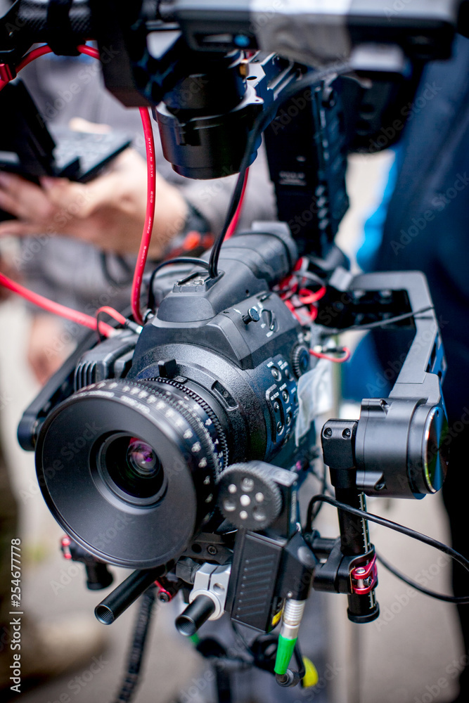 profeccional cinema camera on a 3-axis camera stabilizer system on a ...