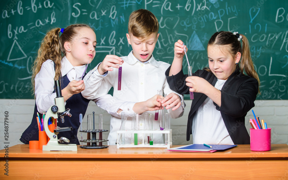 biology education. Little kids learning chemistry in lab. students ...