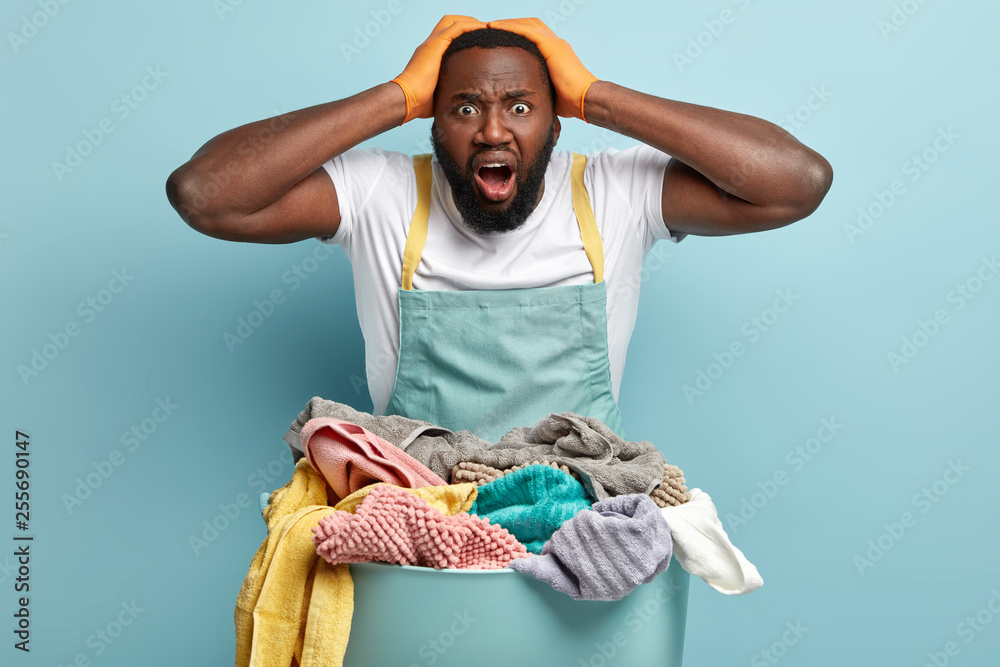 Man Washing Clothes By Hand