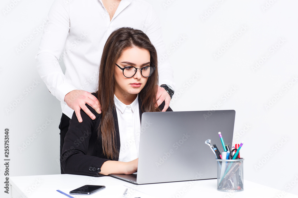 Young workers during break time at work. Young man makes a massage to their business partner ...