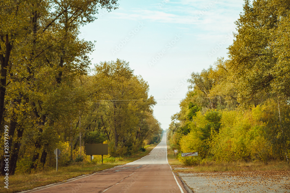 Chornobyl city road sign in exclusion zone. Radioactive zone in Pripyat ...