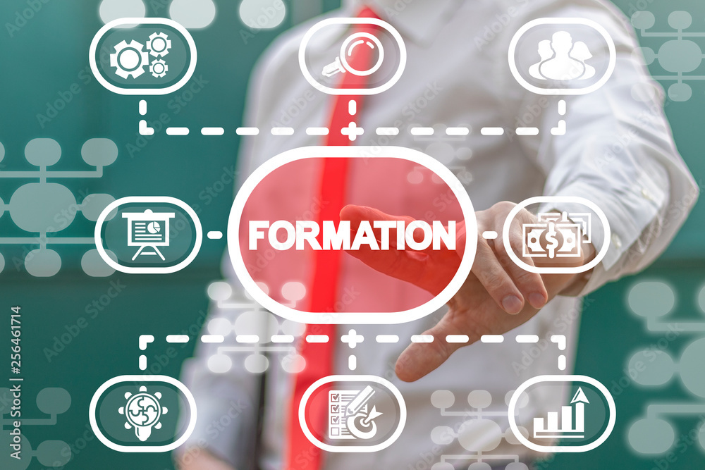 Businessman uses on a virtual screen of the future and touches the word ...