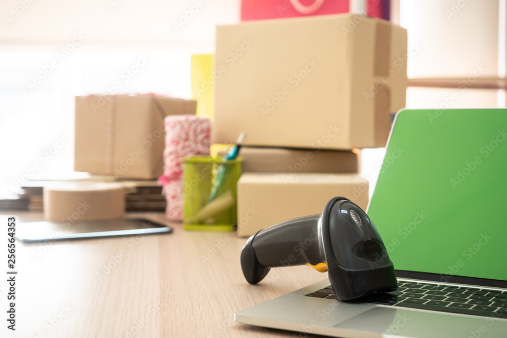 Barcode scanner on green screen laptop computer at home office ...