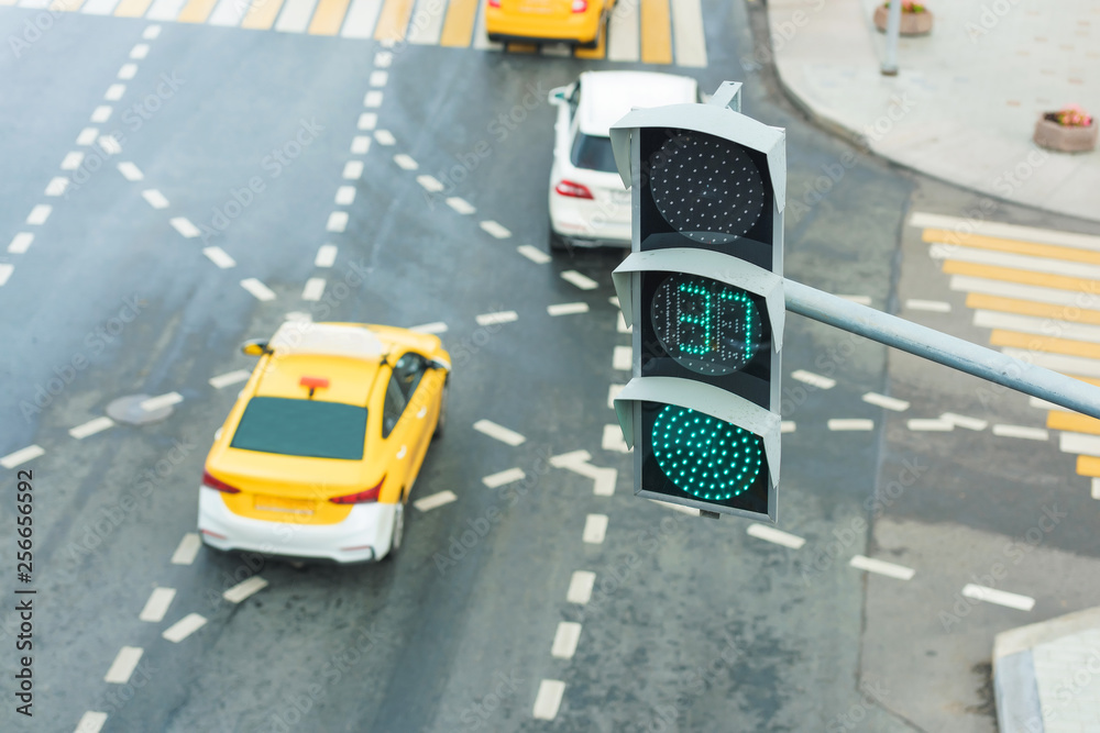 Green traffic light. Modern traffic lights with a timer. Road traffic ...