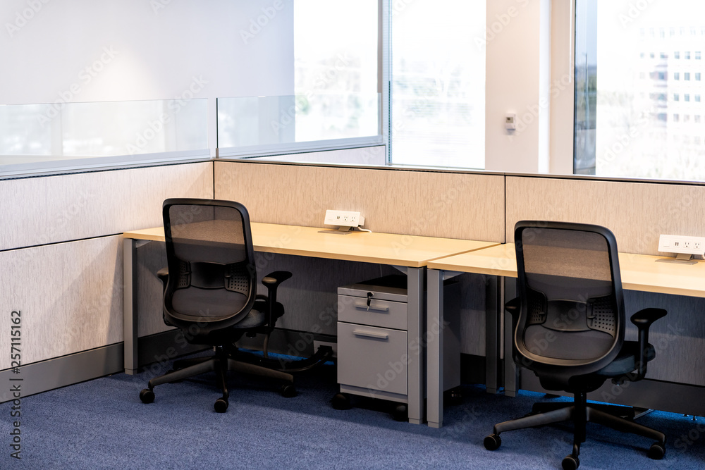 Empty office room with chairs wooden table and power outlet ...