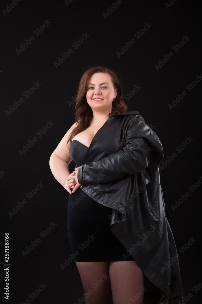 Beautiful young woman plus size with big bust in underwear and Leather ...