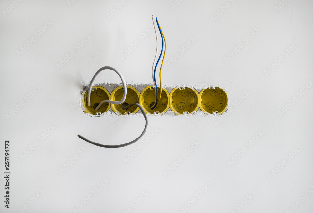 Repair indoors. A white wall with hard putty, gypsum cardboard, an ...