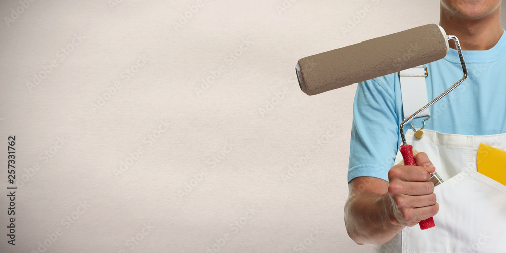 Stock-Foto „Painter hand with painting roller“ | Adobe Stock