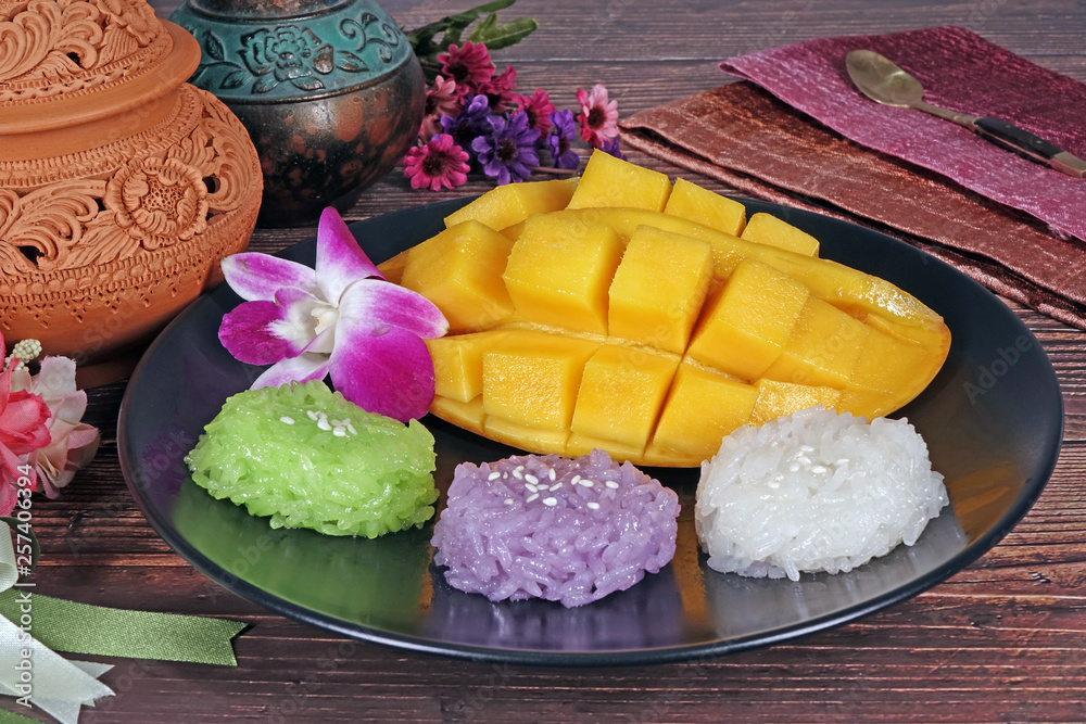 Mango sticky rice, famous Thai dessert. Fresh sliced mango served with ...