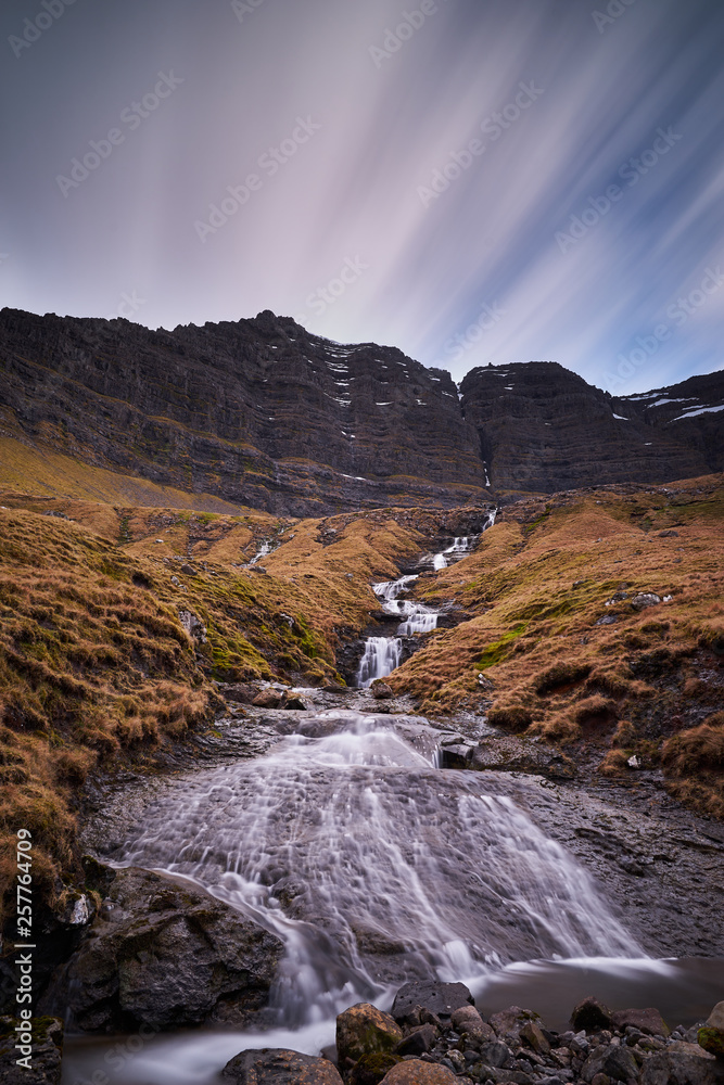 Epic vertical landscape Picture on one of thousands waterfalls and ...