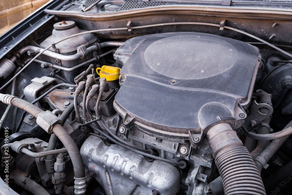 Stock-Foto „Top view under the hood of an old used gasoline engine with ...