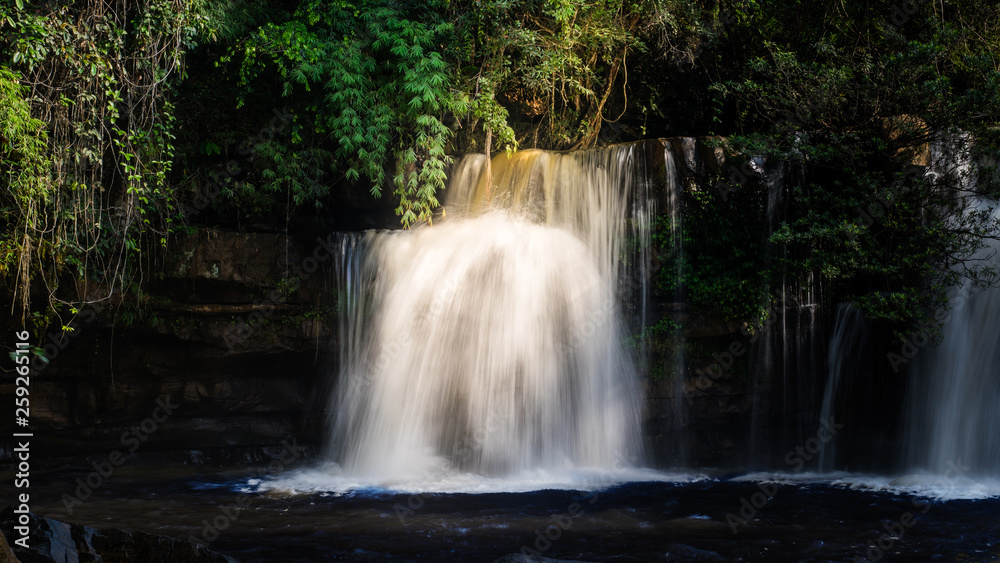 Waterfalls during the rainy season The red soil and water is flowing at ...