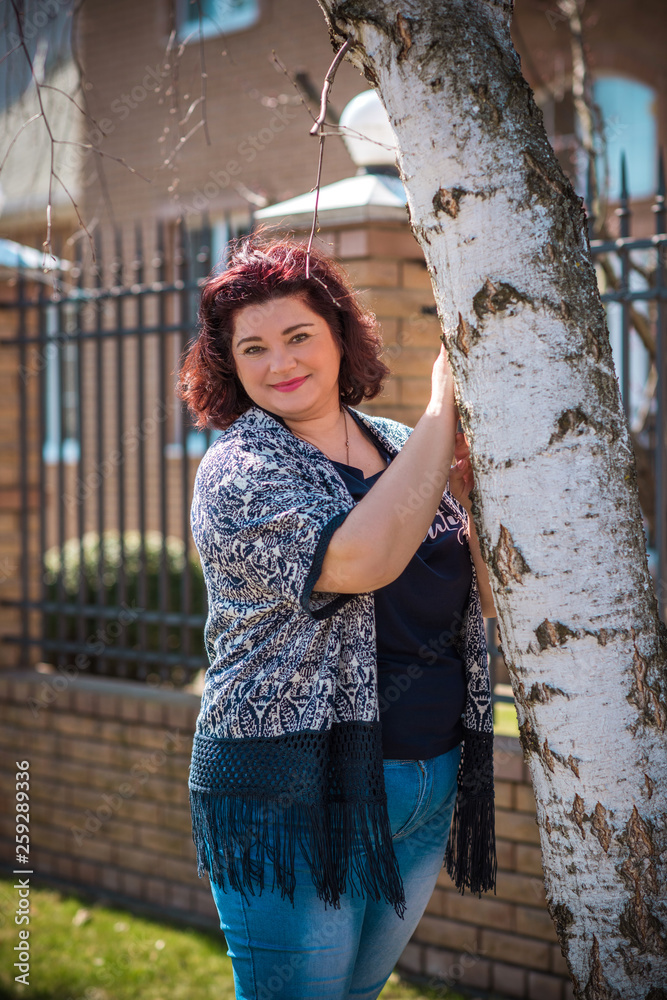 Mature beautiful plus size lady at nature . XXL woman portrait ...