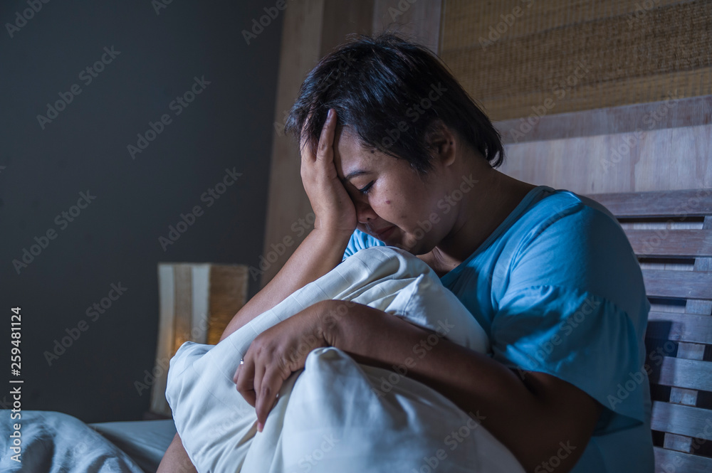 young sad and depressed fat and chubby Asian girl feeling upset and ...