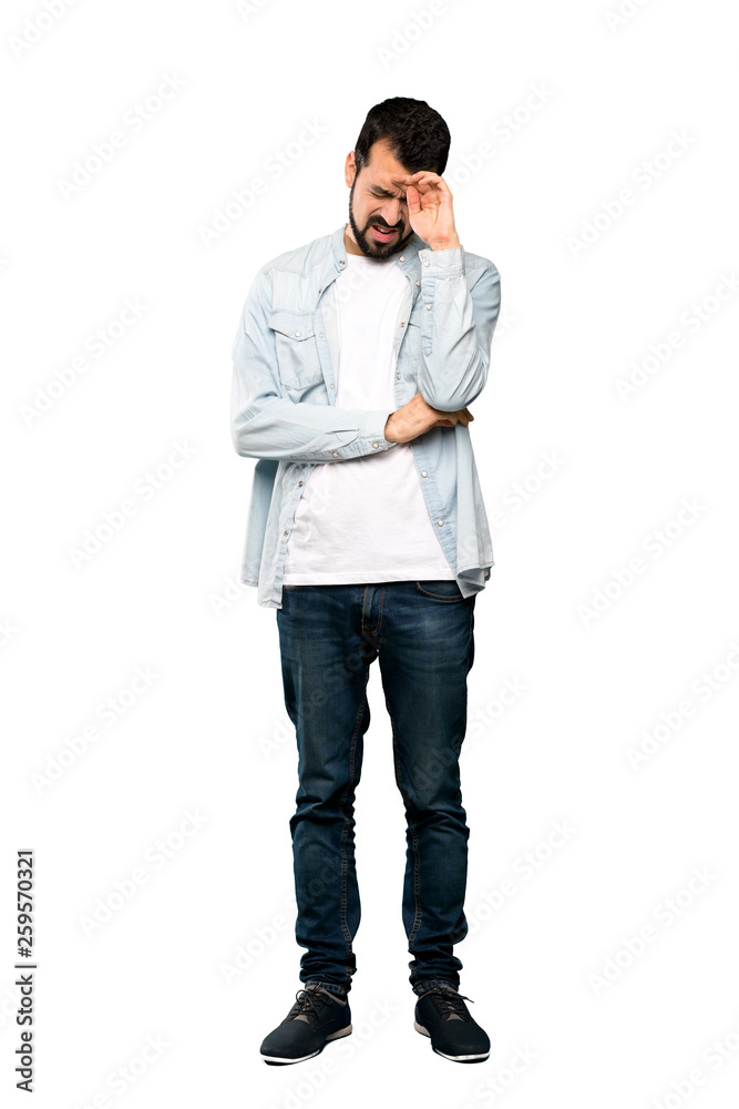 Full-length shot of Handsome man with beard with tired and sick ...