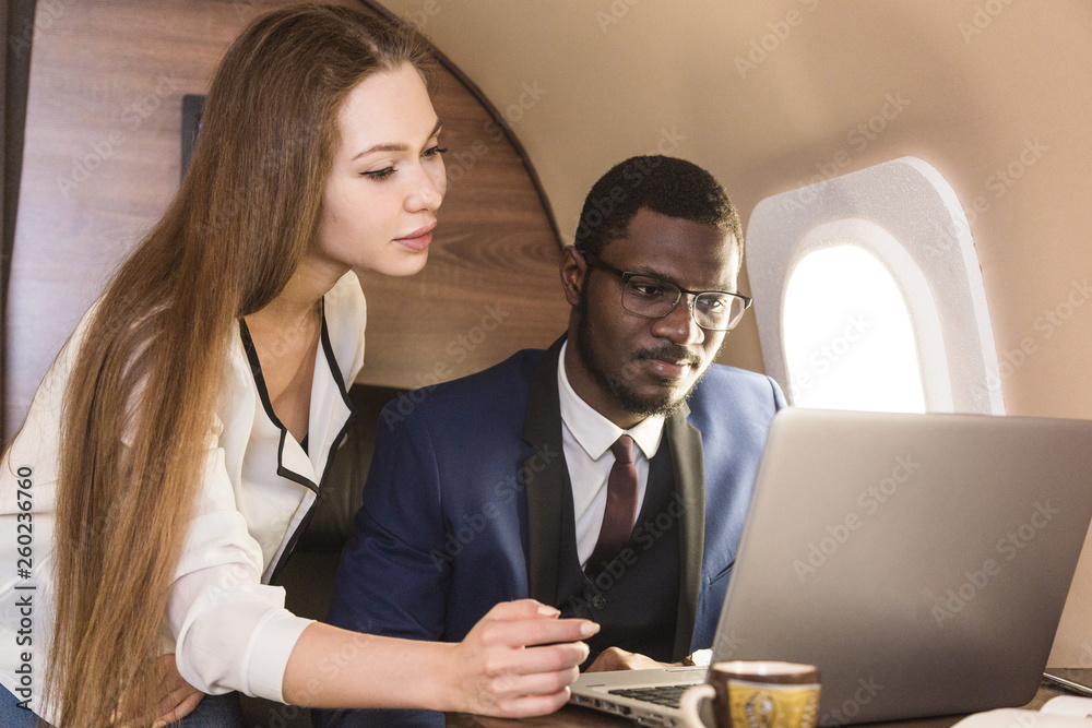 Young successful African-American businessman with glasses and an ...