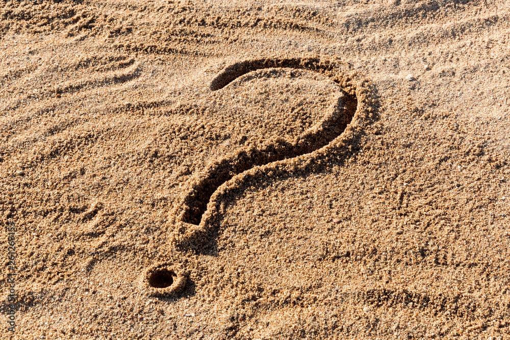 question marks written on beach sand close up, with copy space Stock ...