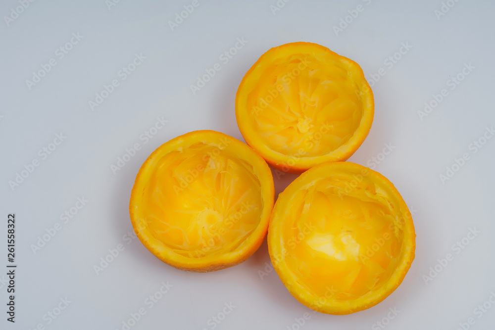 Orange skin after fresh squeezed juice. Half an orange without pulp on ...